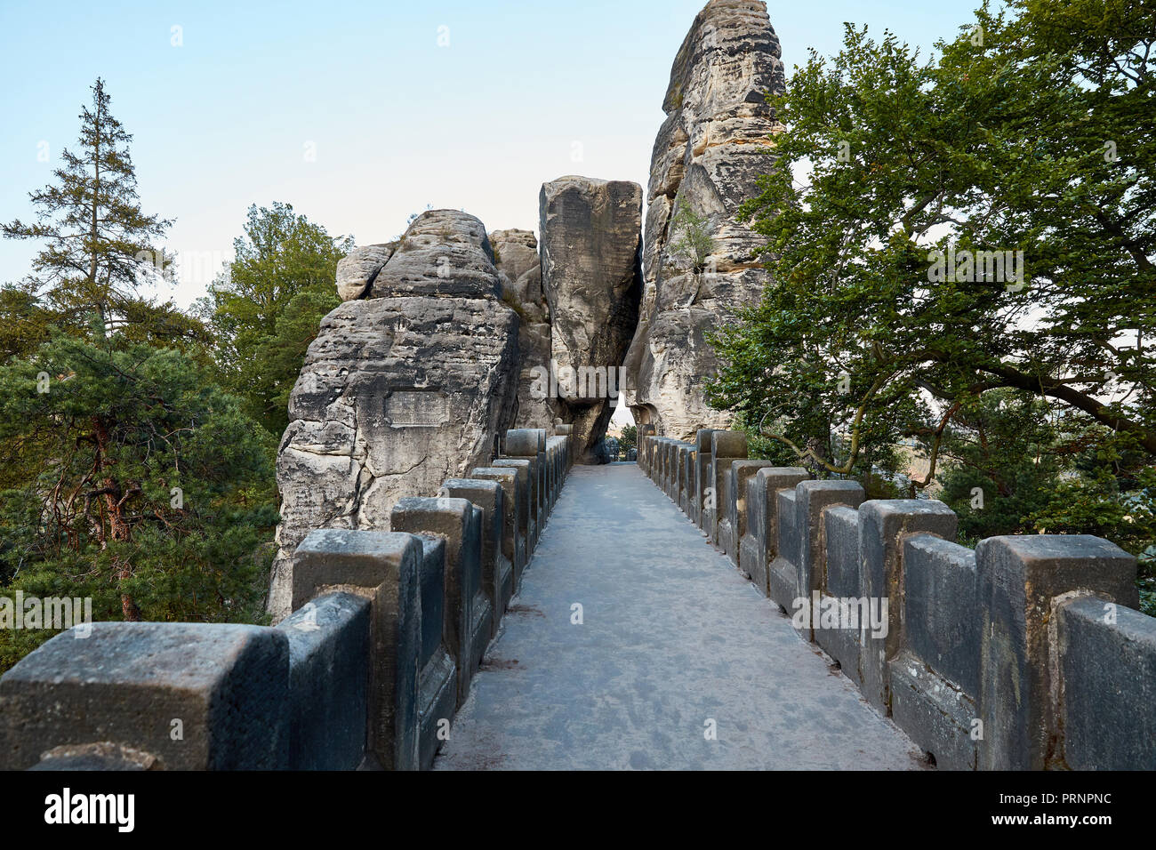 stone bridge, old rocks and forest in Bastei, Germany Stock Photo - Alamy