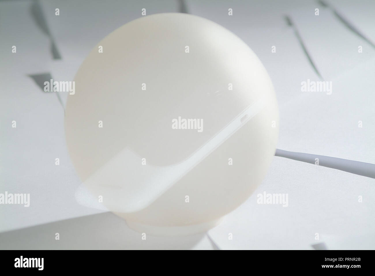 Multi-exposure. the white ball Stock Photo - Alamy