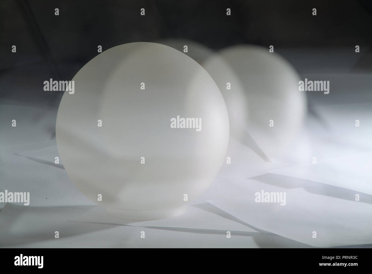Multi-exposure. the white ball Stock Photo - Alamy