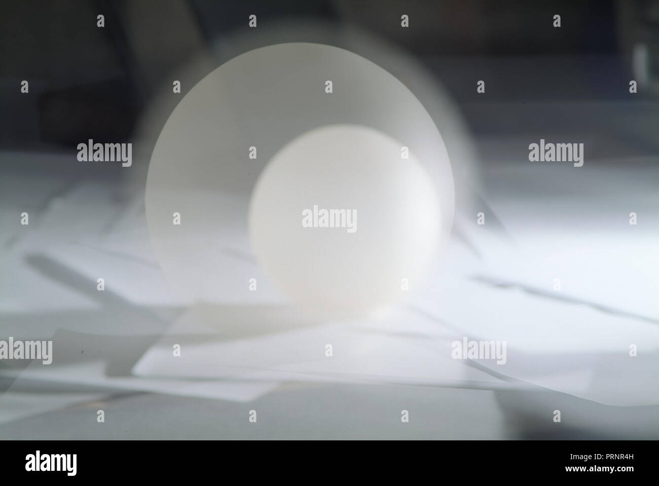 Multi-exposure. the white ball Stock Photo - Alamy