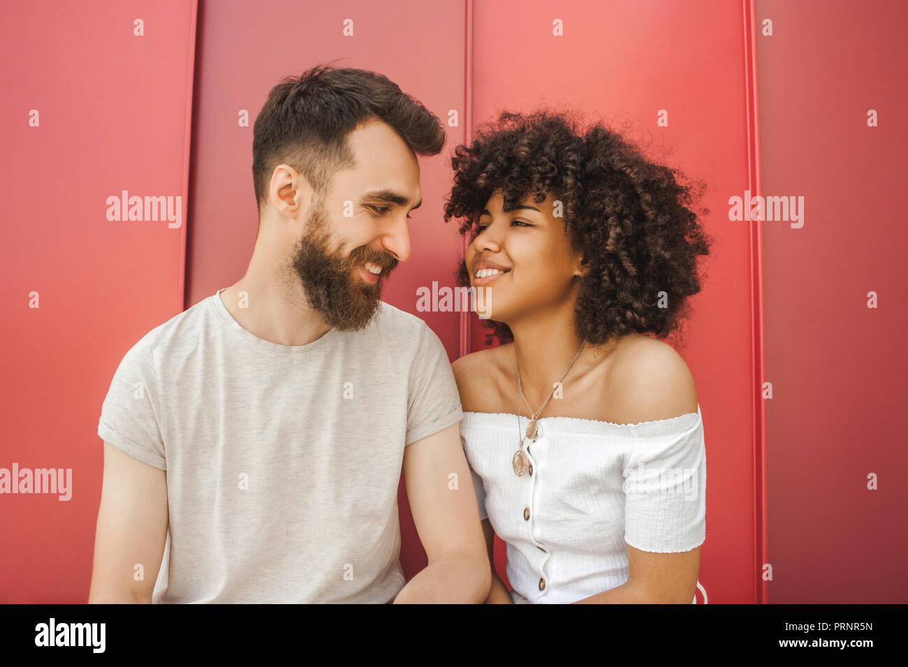 beautiful happy young stylish multiethnic couple smiling together Stock ...