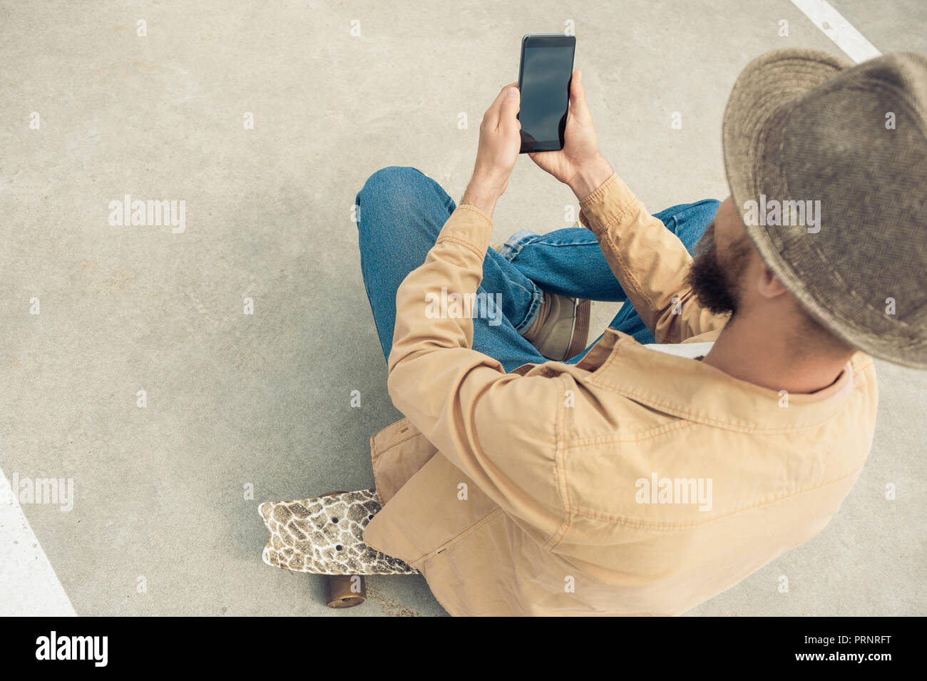 Overhead view man sitting hi-res stock photography and images - Alamy