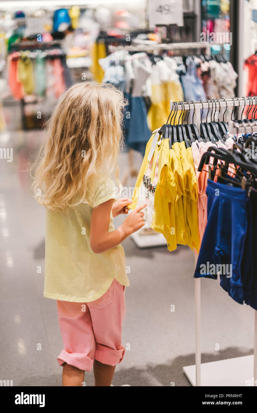 Child choosing clothes hi-res stock photography and images - Alamy