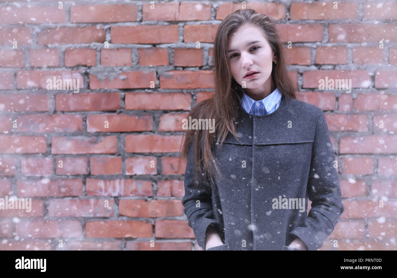 Young girl outdoors in winter. Model girl posing outdoors on a w Stock ...