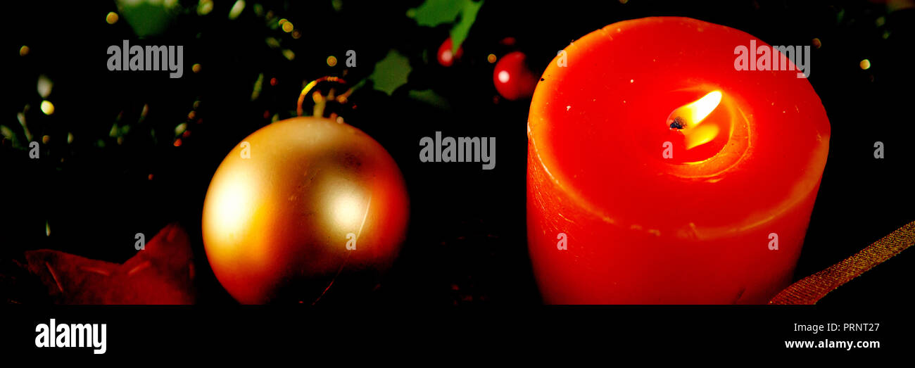 Christmas red circle candles with gold ball Stock Photo - Alamy
