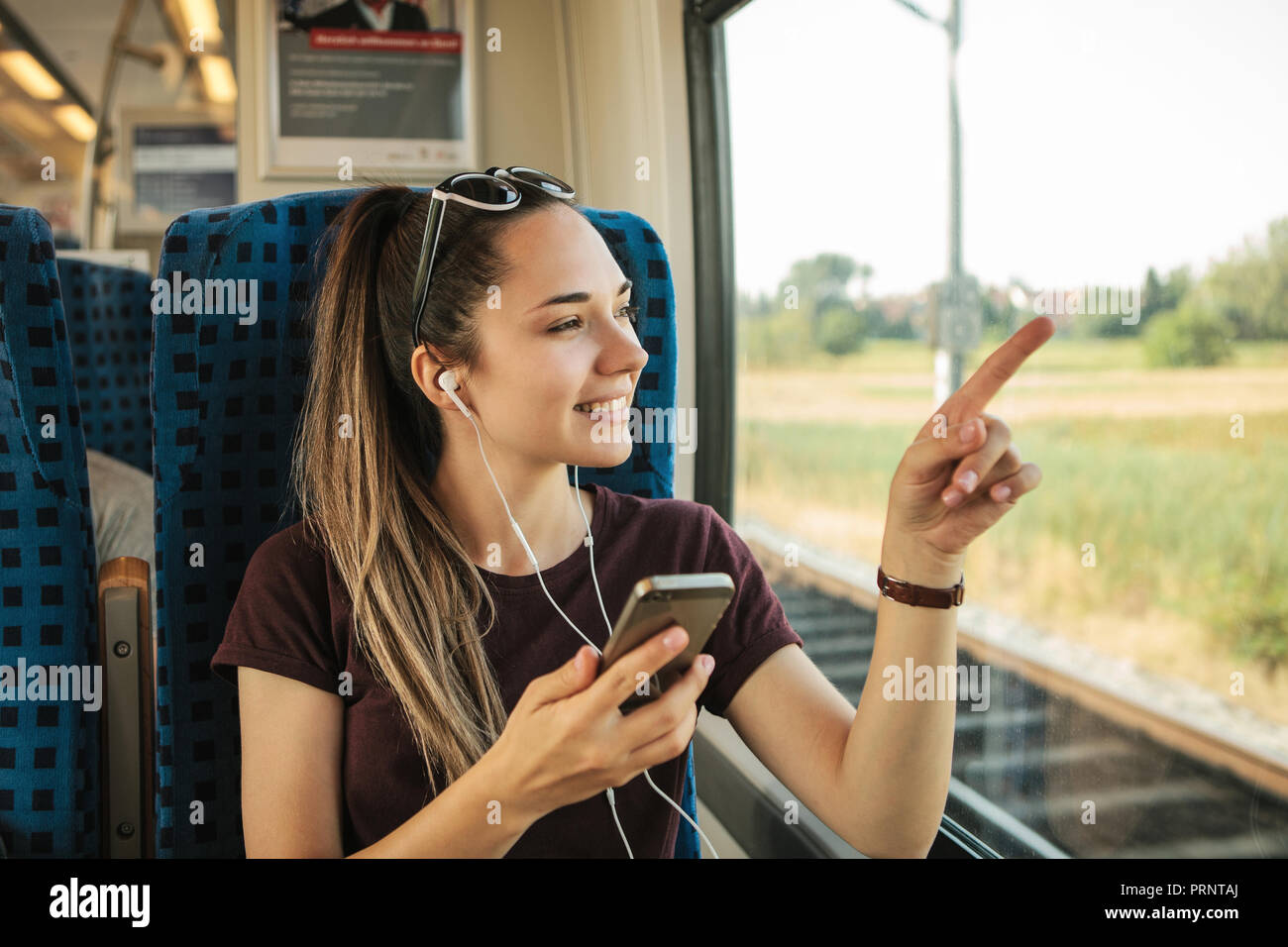 Girl enjoying train ride hi-res stock photography and images - Alamy