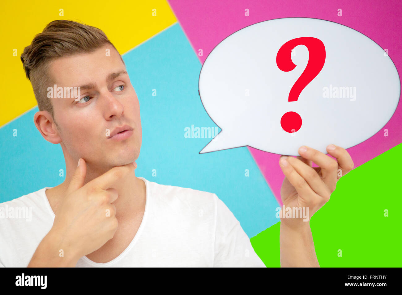 portrait of blond man holding a speech bubble with a question mark ...