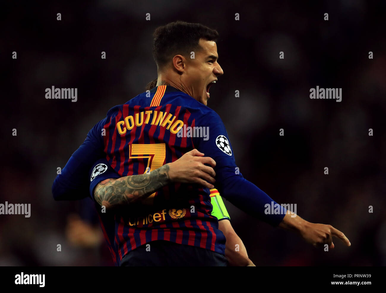 Barcelona's Philippe Coutinho celebrates scoring the opening goal with ...