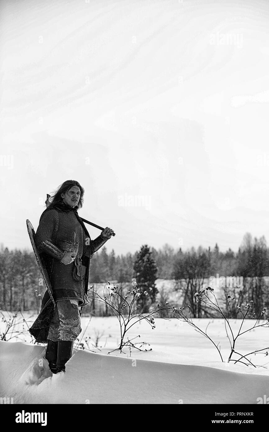 Defender the young warrior in armor Stock Photo - Alamy