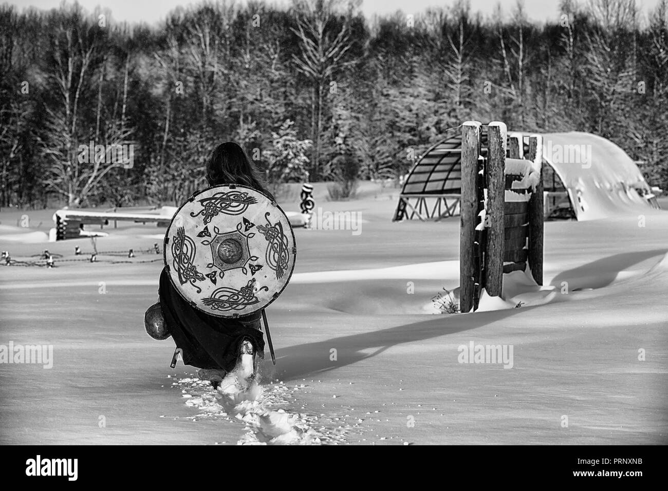 Defender the young warrior in armor Stock Photo - Alamy