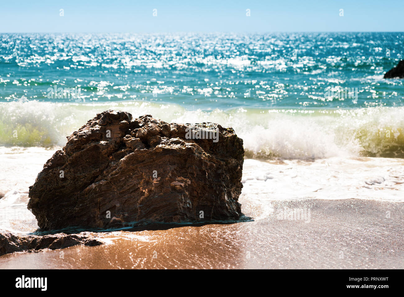 Malibu seashore rock Stock Photo - Alamy