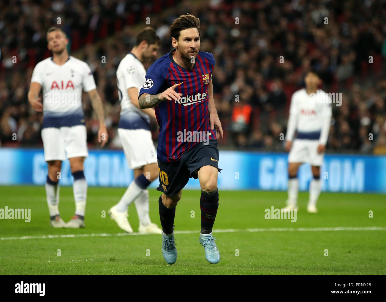 Barcelona's Lionel Messi celebrates scoring his sides third goal during ...