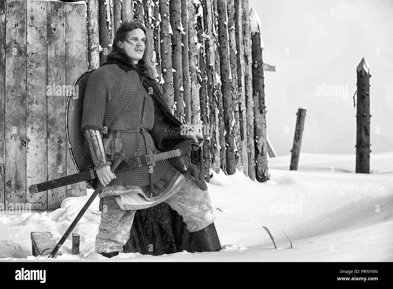 Defender the young warrior in armor Stock Photo - Alamy