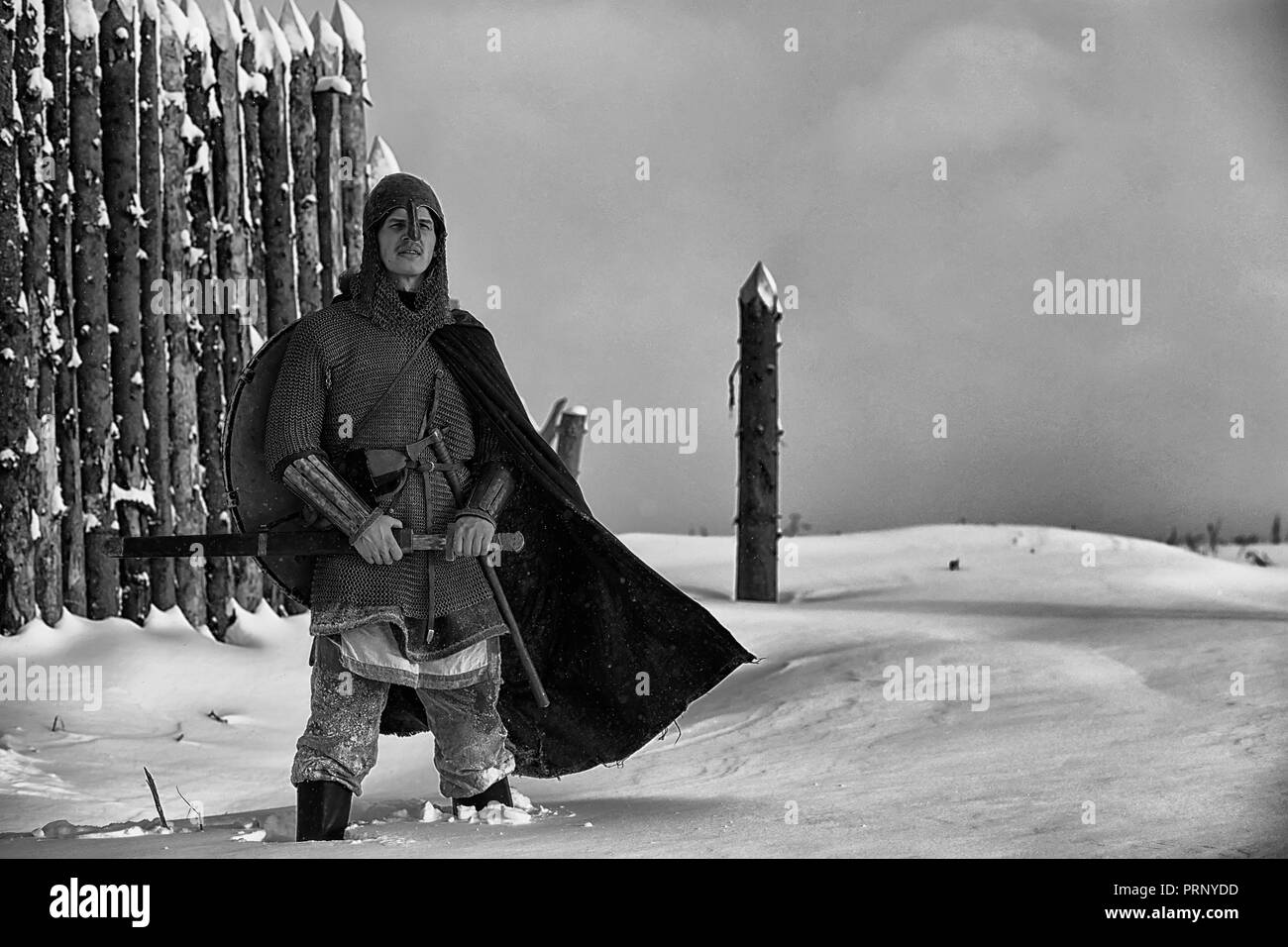Defender the young warrior in armor Stock Photo - Alamy