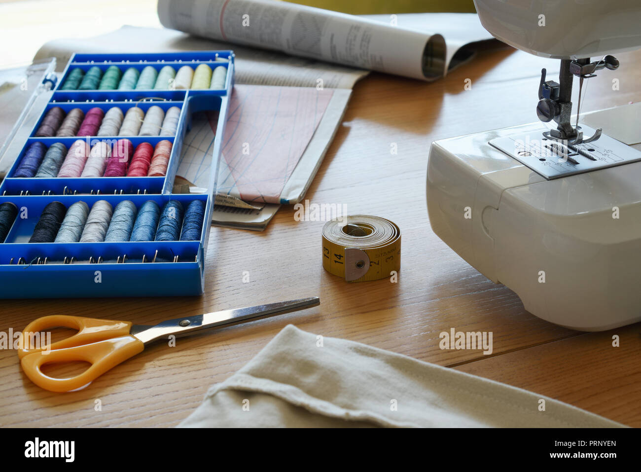 Sewing at home with sewing machine and some tools Stock Photo - Alamy