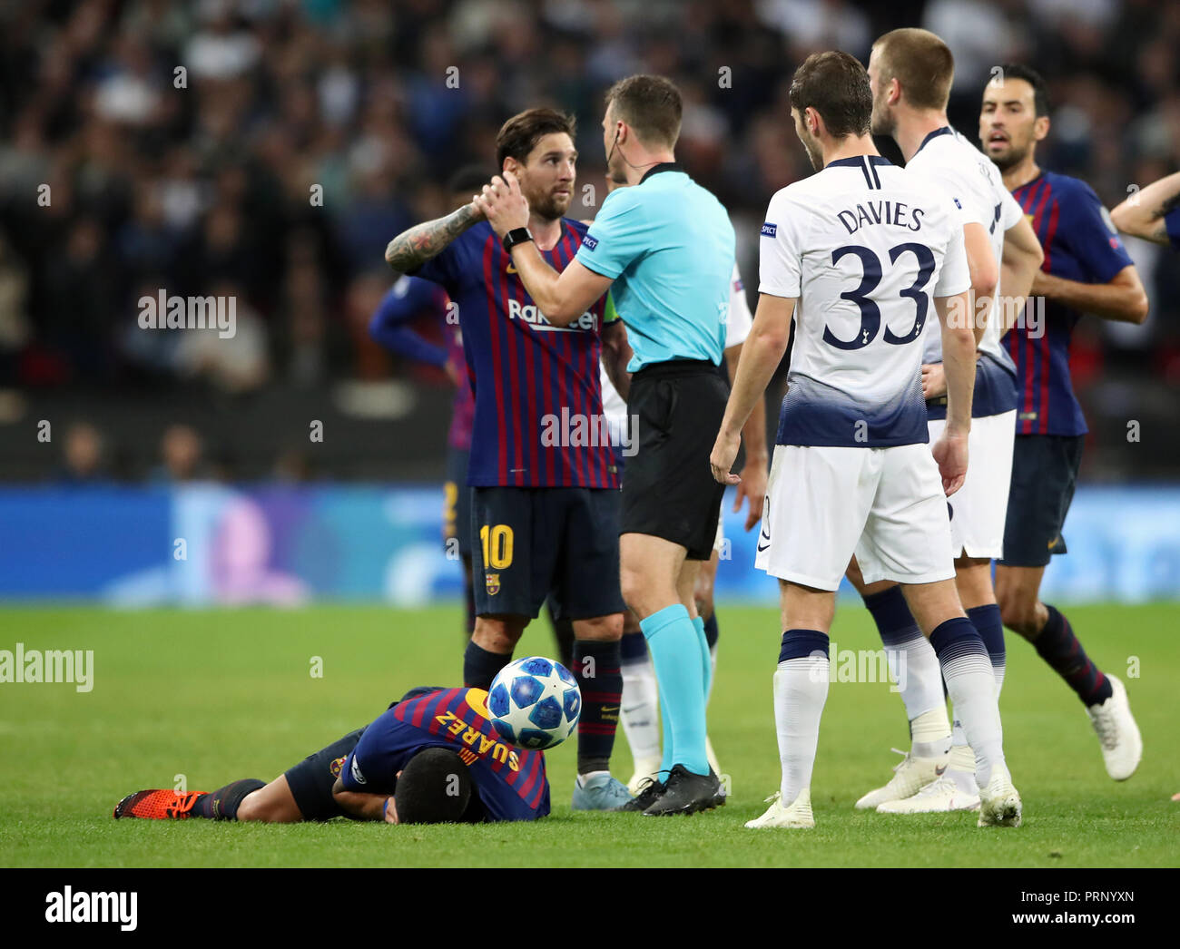 Barcelona's Lionel Messi gestures towards the referee following a ...