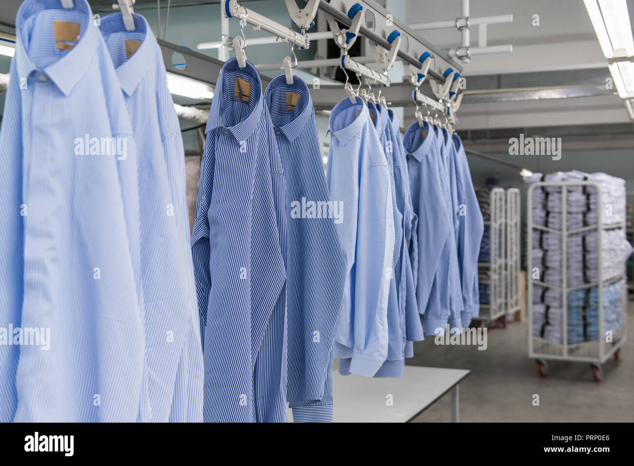 Shirt hanging on hook hi-res stock photography and images - Alamy