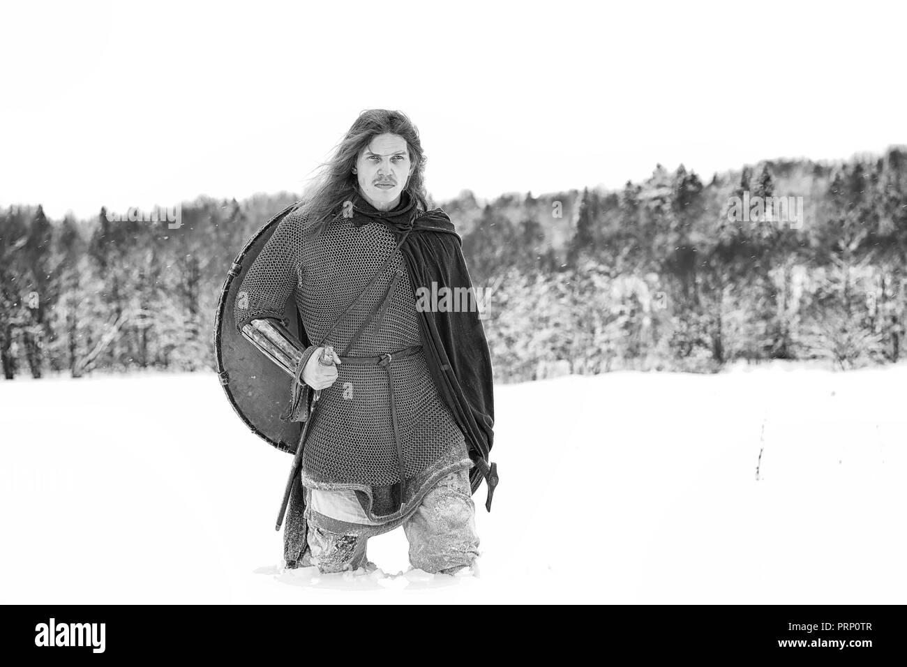 Defender the young warrior in armor Stock Photo - Alamy