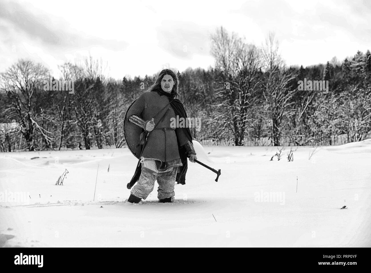 Defender the young warrior in armor Stock Photo - Alamy