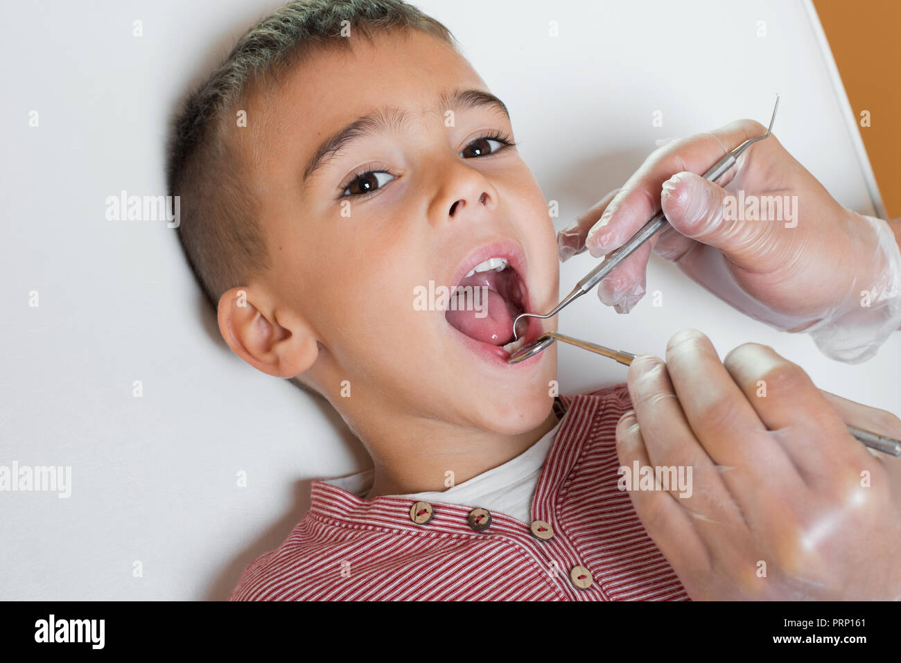 Dental examination to child close up Stock Photo - Alamy