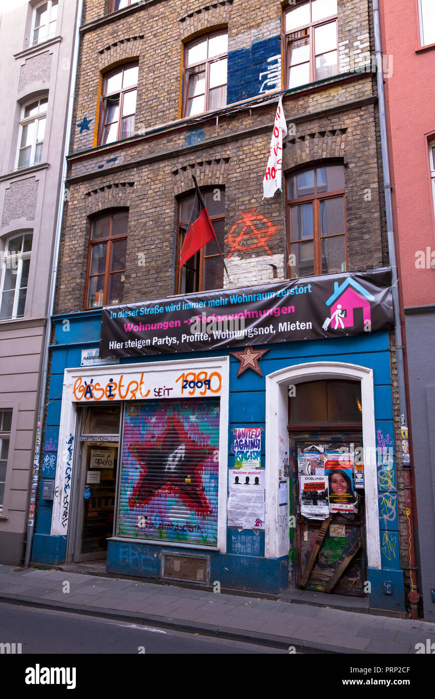 house with protest posters against gentrification in the street Im ...