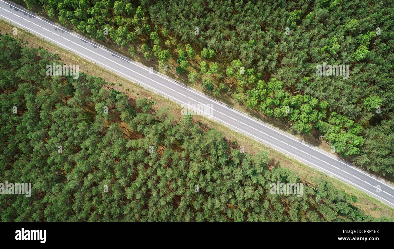 Aerial landscape - road in the forest Stock Photo - Alamy