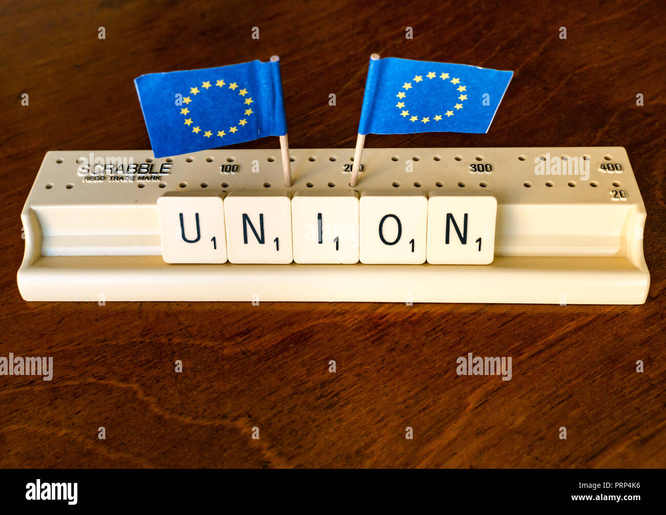 Scrabble letters spelling Union in Scrabble tray with Eurpean Union ...