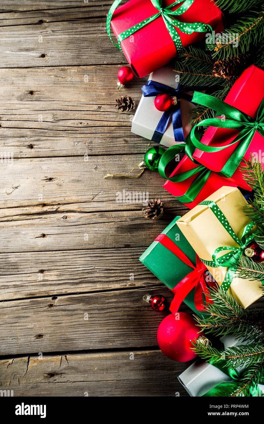 Christmas festive background with decorations and colorful gift boxes ...