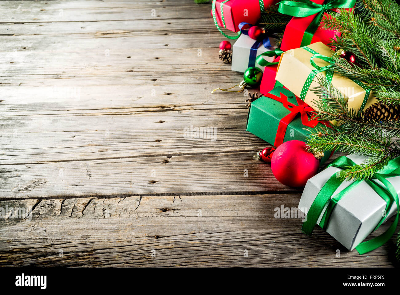 Christmas festive background with decorations and colorful gift boxes ...
