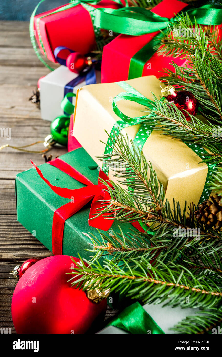 Christmas festive background with decorations and colorful gift boxes ...