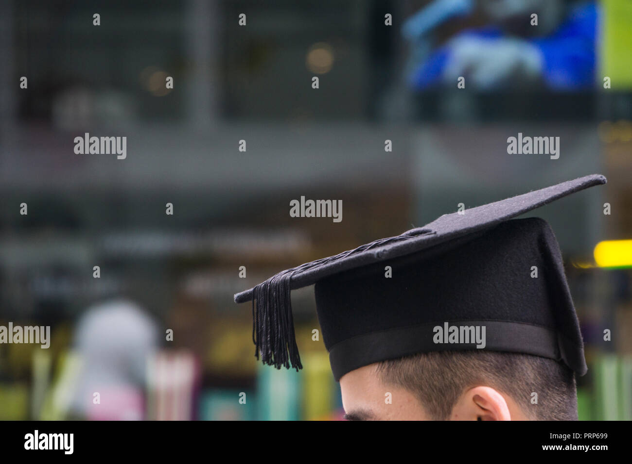 Student graduating with a university degree Stock Photo - Alamy