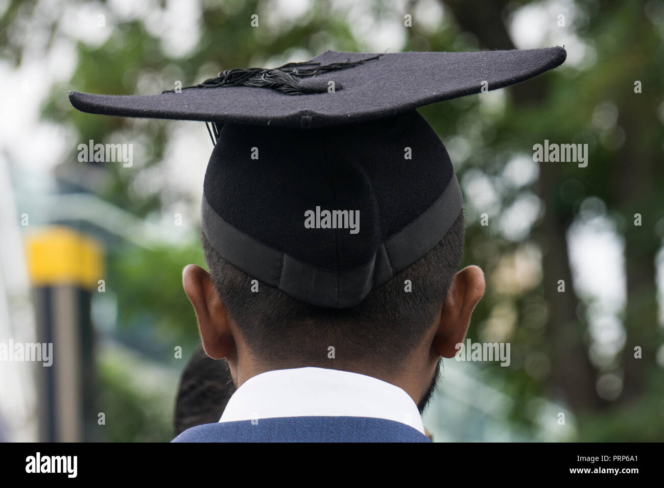 Student graduating with a university degree Stock Photo - Alamy