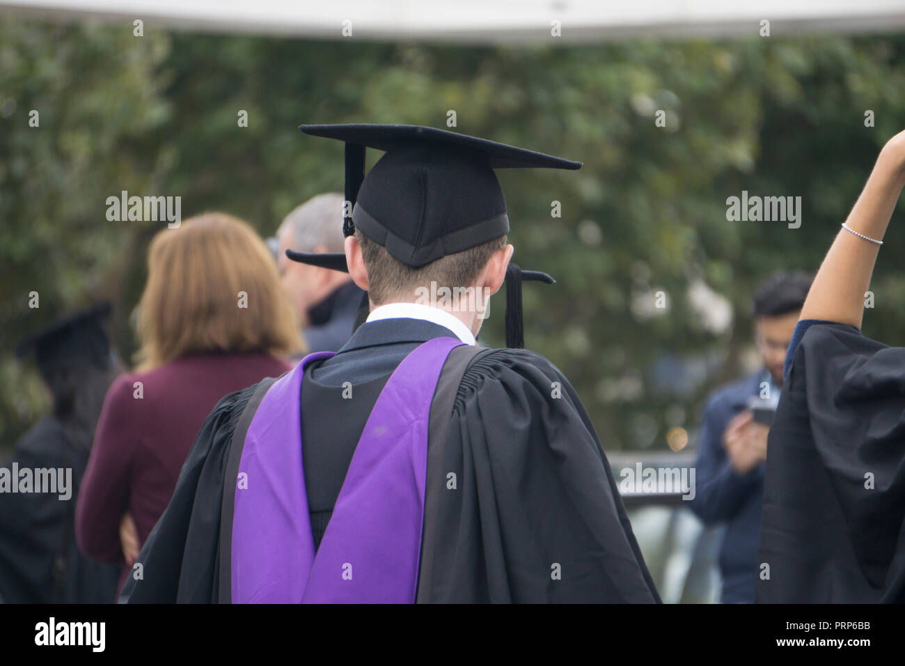 Cheerful student in graduating hi-res stock photography and images - Alamy