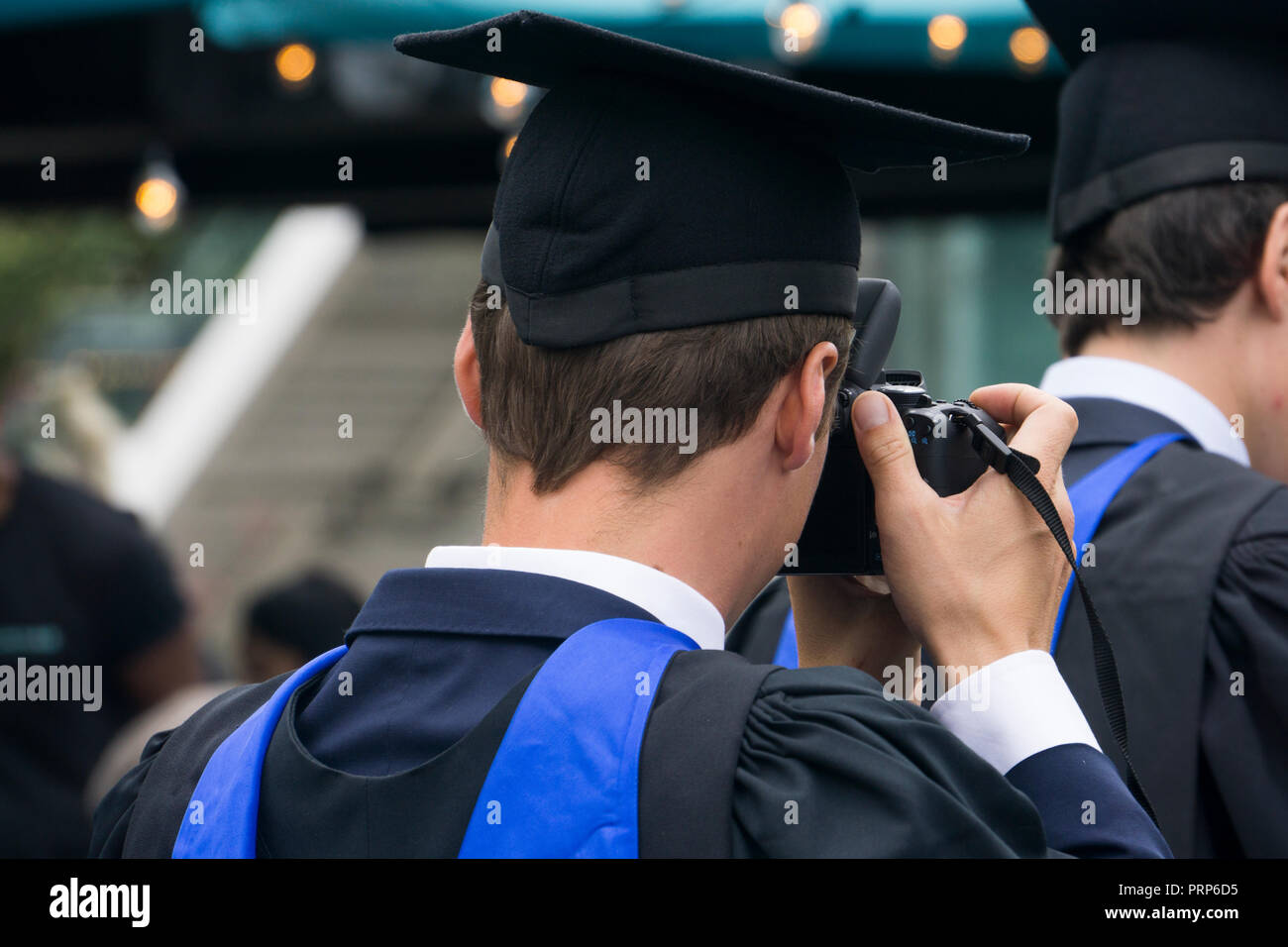 Student graduating with a university degree Stock Photo - Alamy