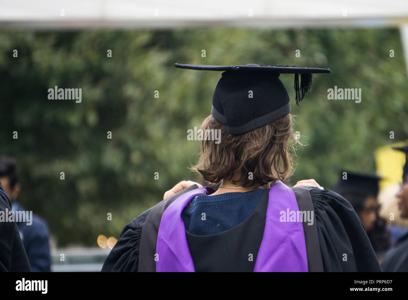 Student graduating with a university degree Stock Photo - Alamy