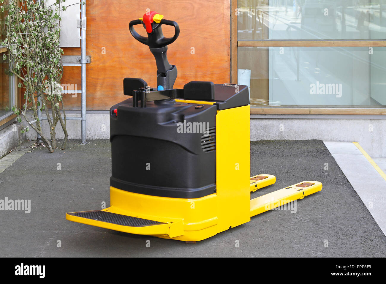 Pedestrian pallet truck lifting equipment for warehousing Stock Photo ...