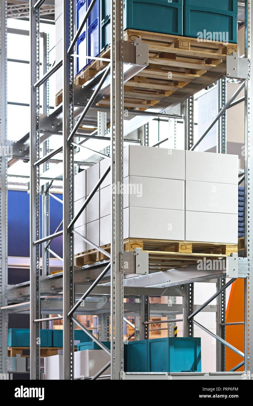 High racking warehouse for cargo pallets storage Stock Photo - Alamy
