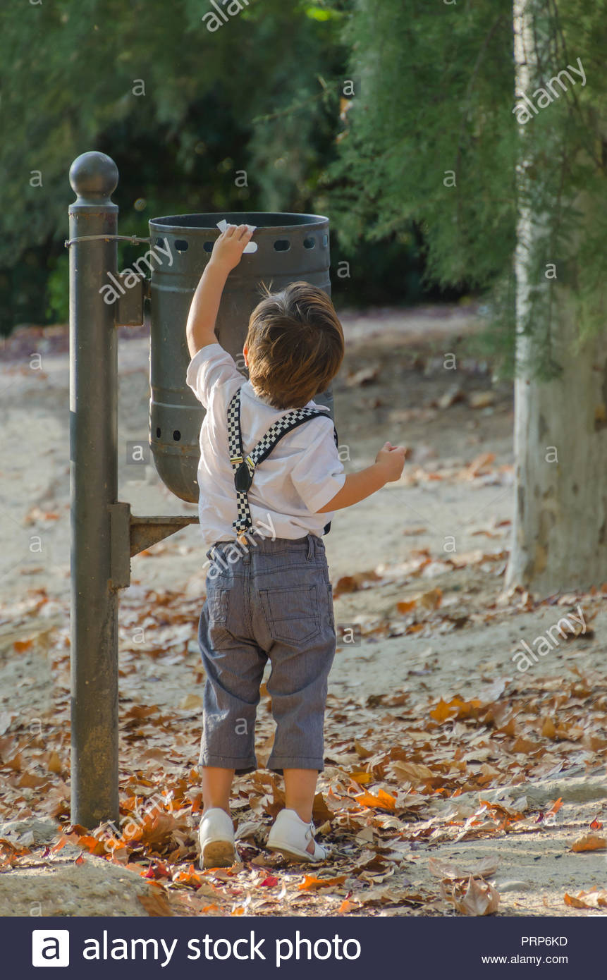 Child Throwing Garbage Stock Photos & Child Throwing Garbage Stock ...