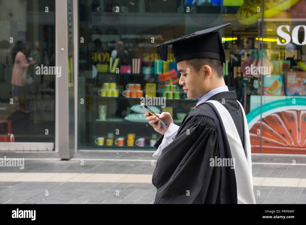 University graduates attend graduation ceremony hi-res stock ...