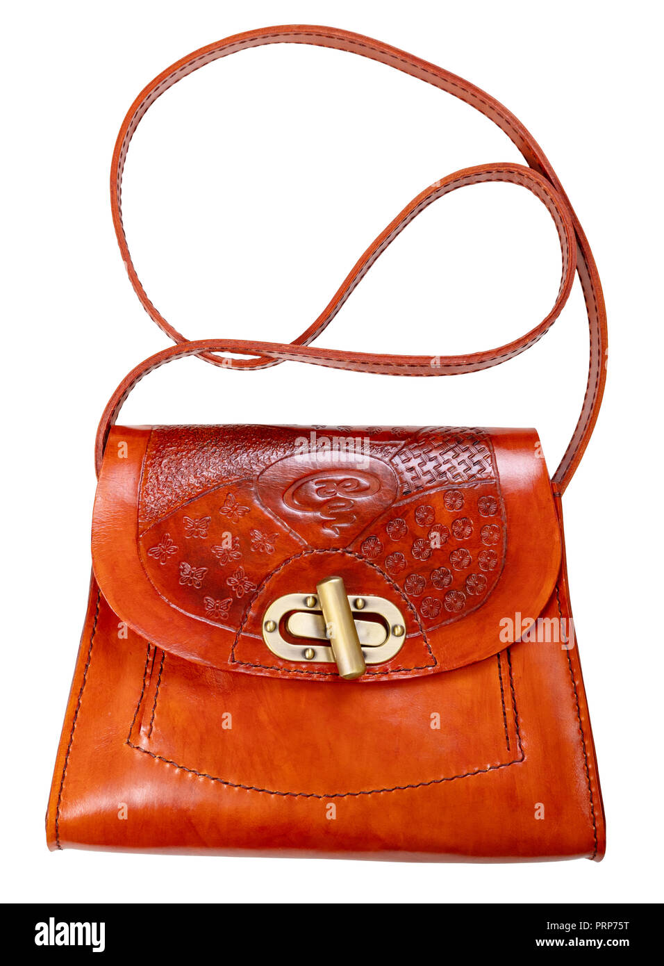 handmade orange colored embossed leather bag cut out on white ...