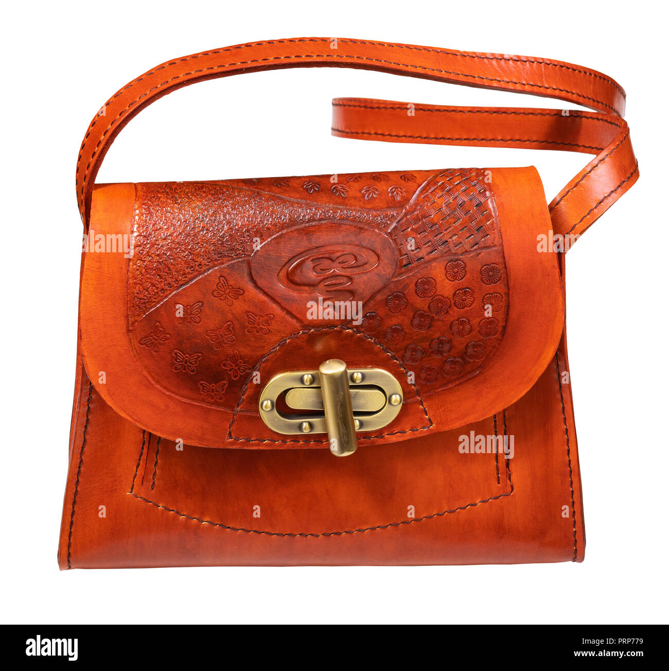 handmade orange colored embossed leather handbag cutout on white ...