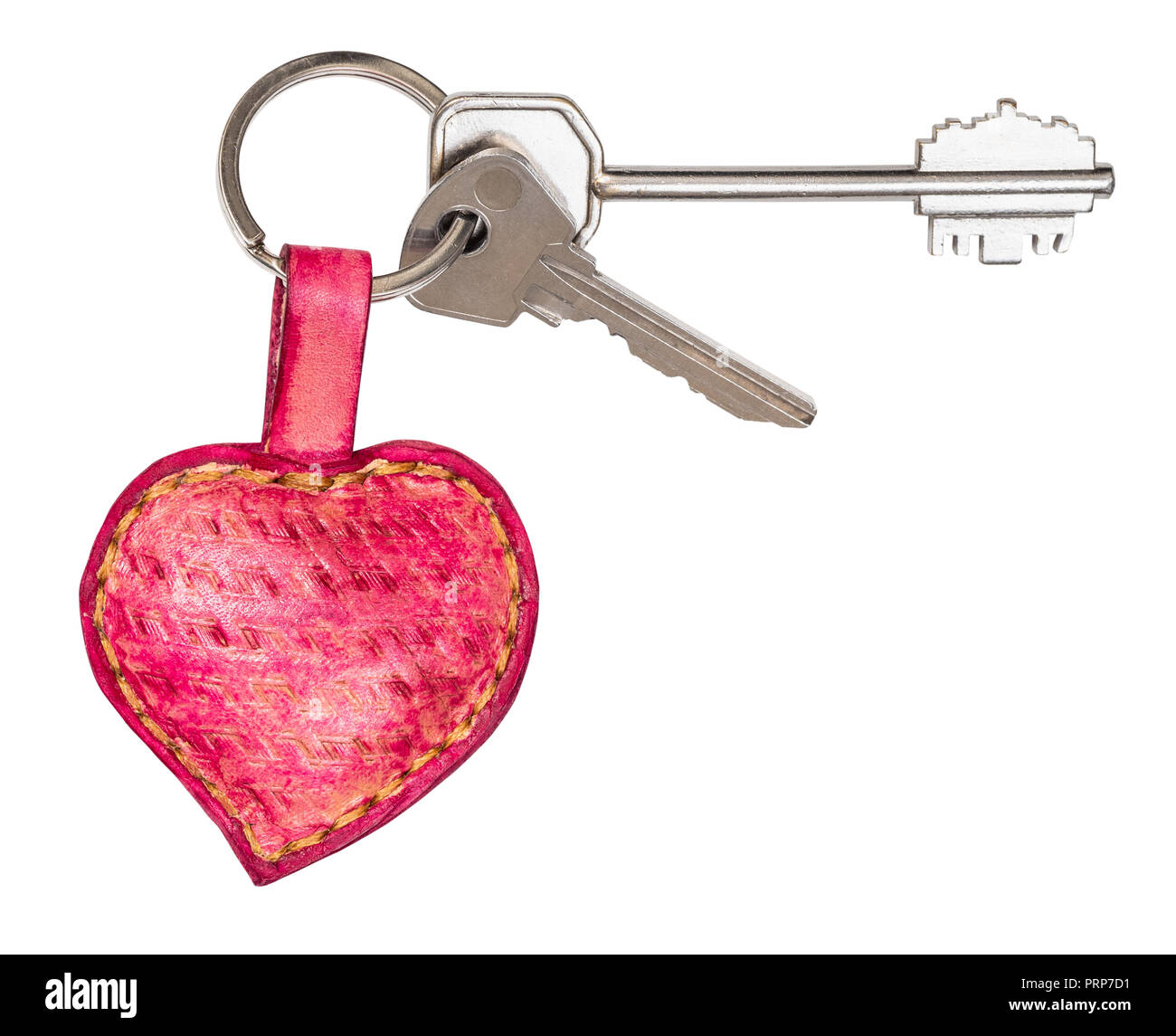 bunch of keys on pink colored embossed leather heart shaped key fob ...