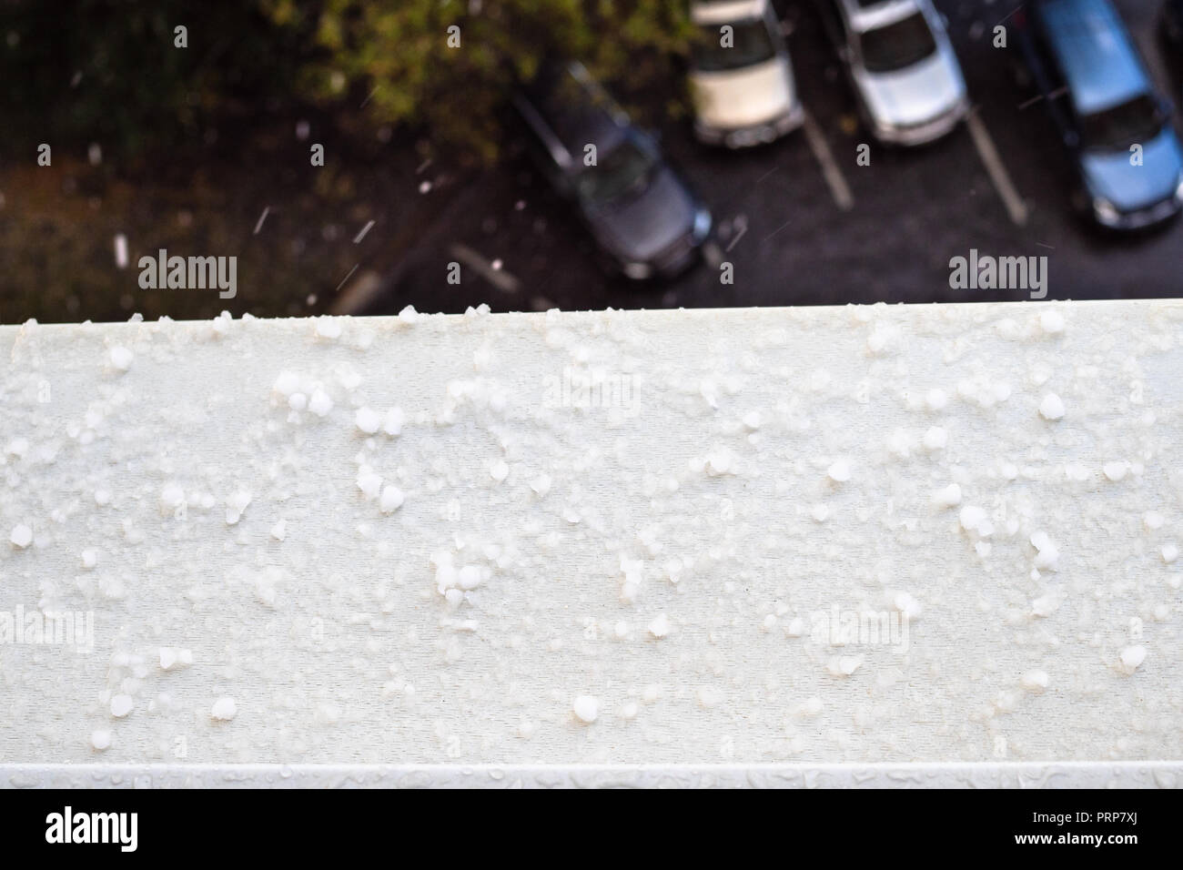 rain and hail fall on the window sill in autumn day Stock Photo - Alamy