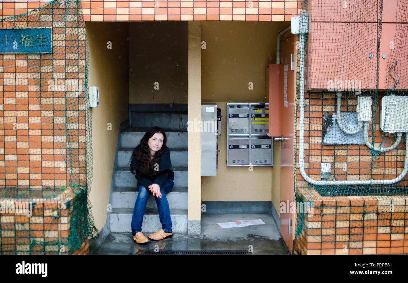 Japanese Girl poses on the street in Fussa, Japan. Fussa is a city located in Tokyo Stock Photo ...
