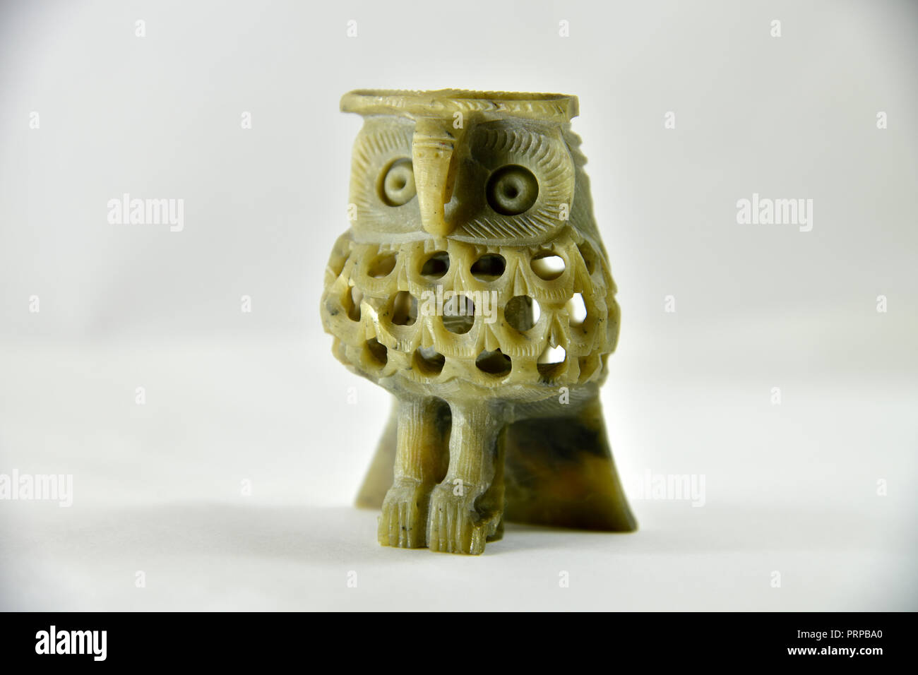 Carved Grey Marble Stone double cut Owl sculpture Stock Photo - Alamy
