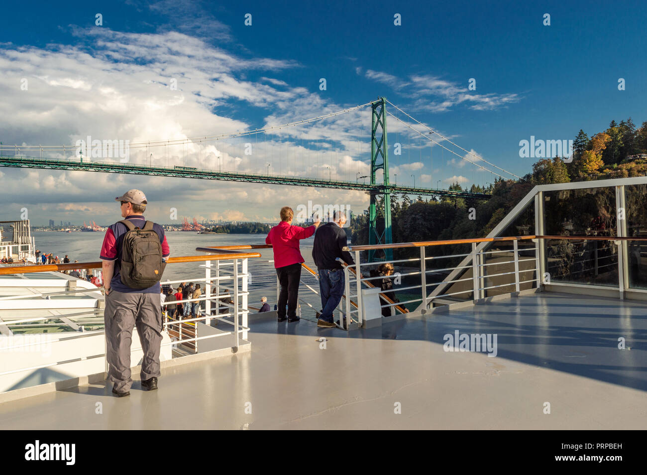 Cruise ship passengers on top deck of Holland America The Volendam, as ...
