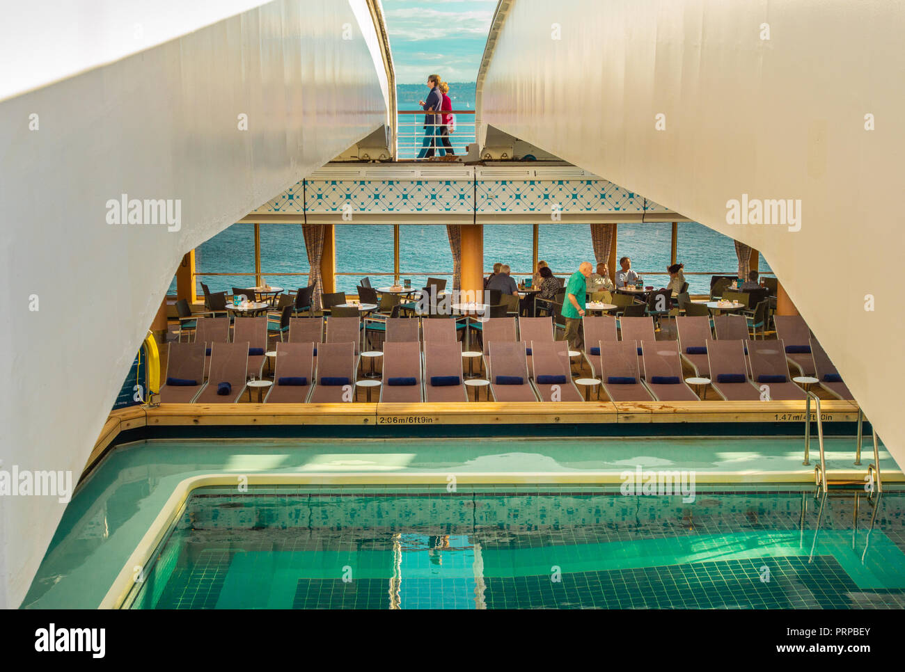 Lido Deck swimming pool under retractable roof. The Volendam, Holland ...