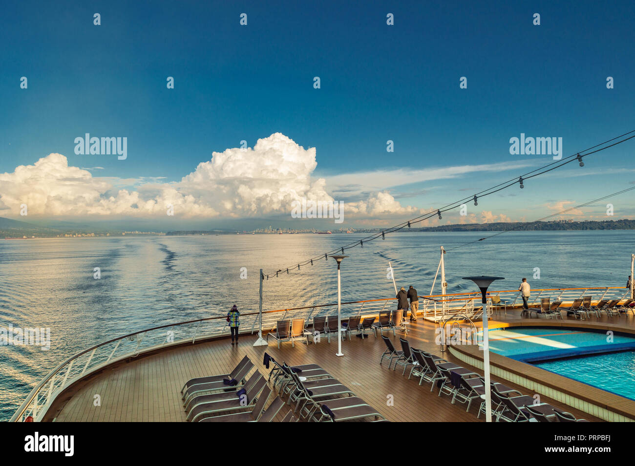 Cruise ship passengers on rear outdoor Lido deck beside The Seaview ...
