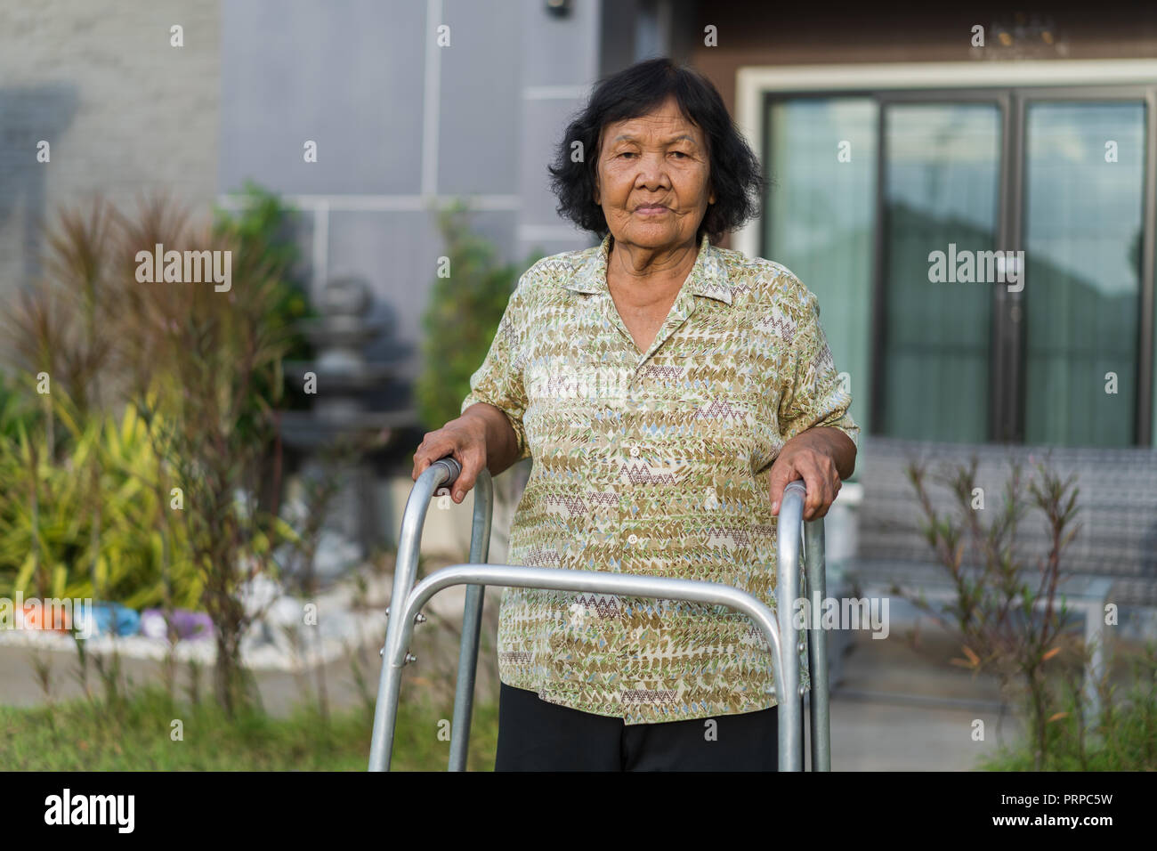 Old woman walking aid hi-res stock photography and images - Alamy