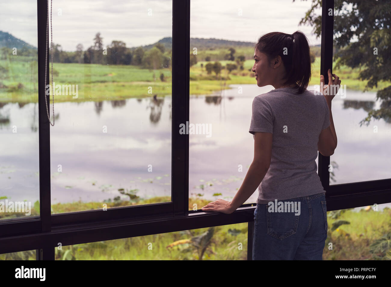 Side view beautiful woman opening hi-res stock photography and images ...